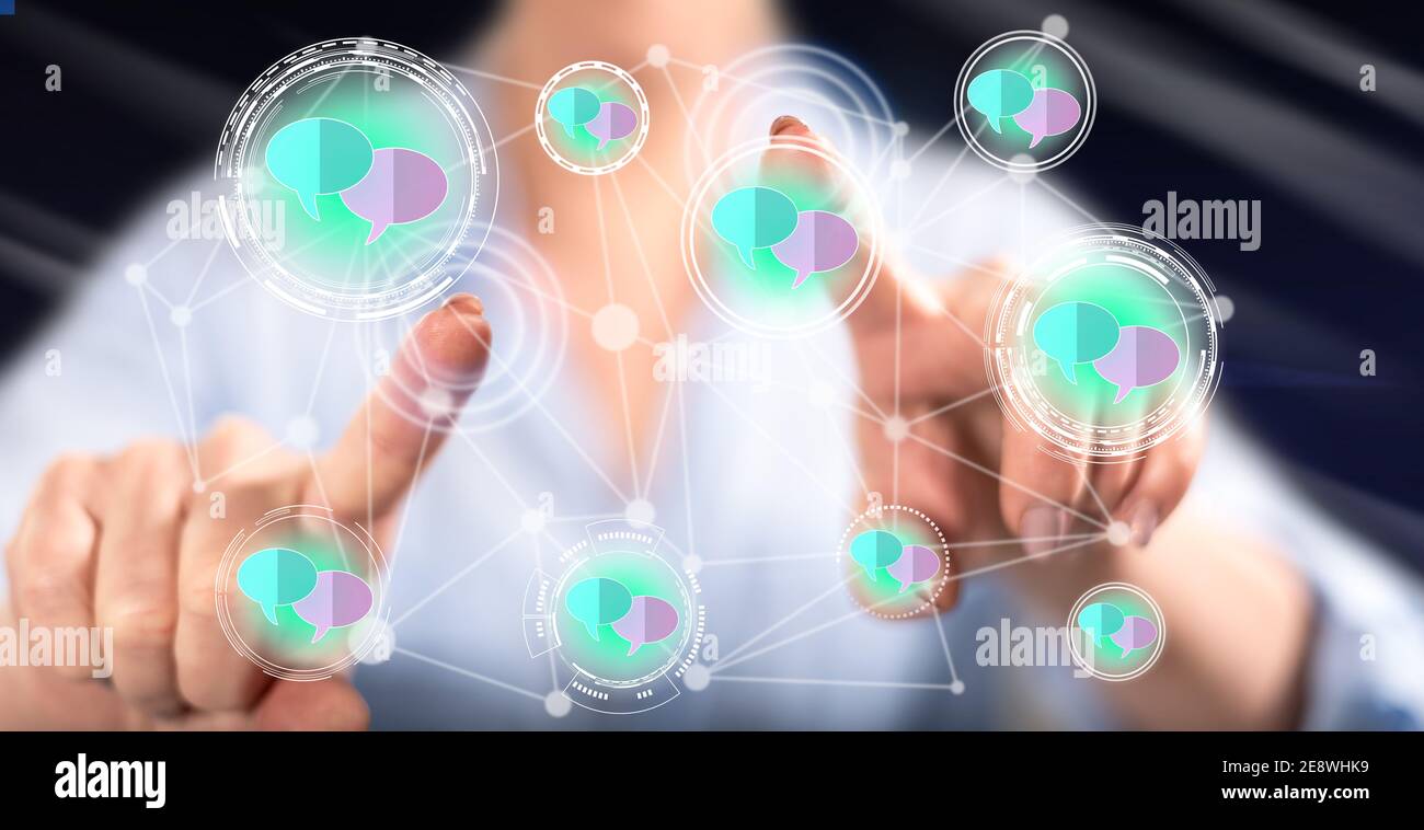 Woman touching a communication network concept on a touch screen with ...