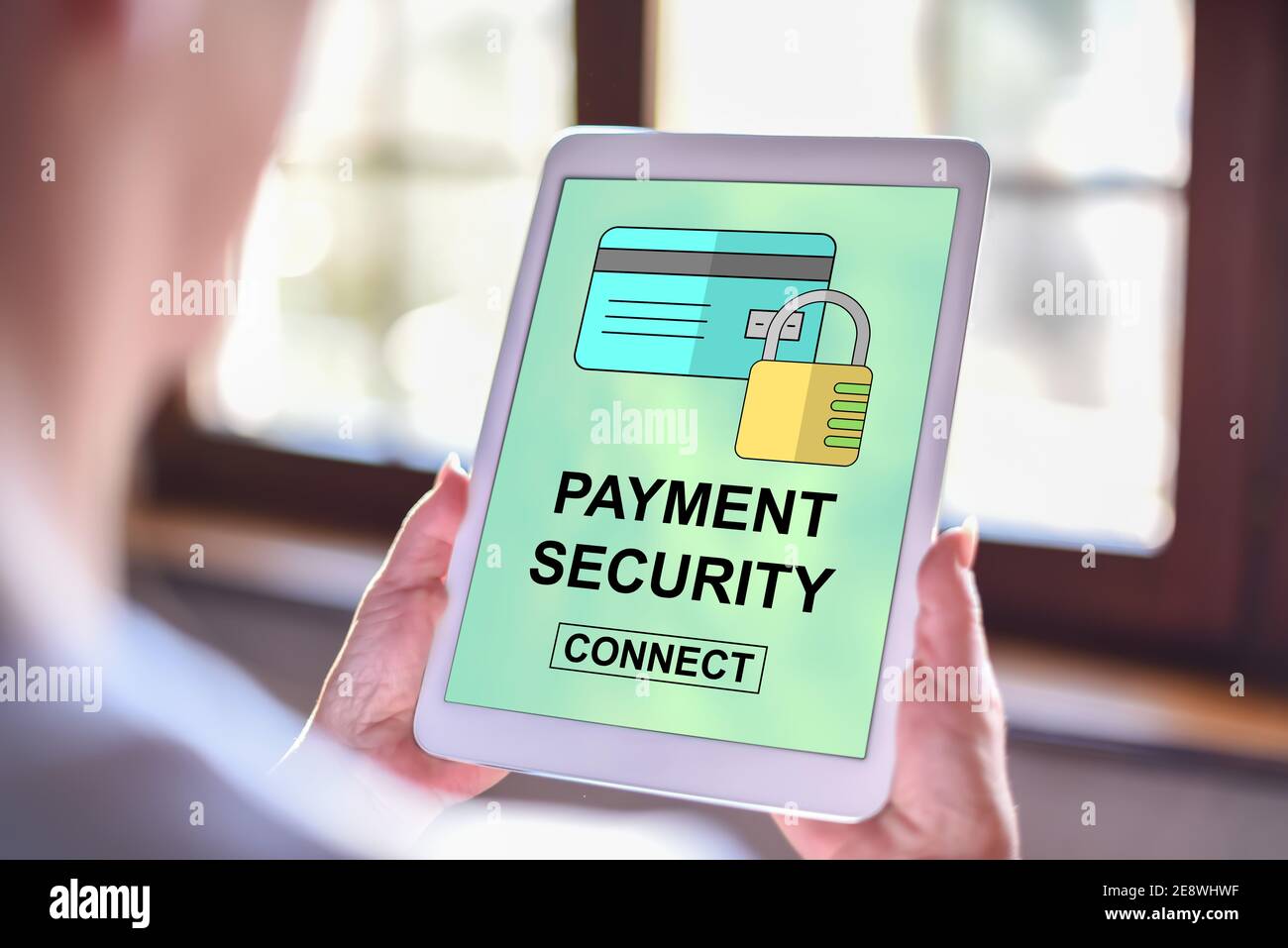 Tablet screen displaying a payment security concept Stock Photo - Alamy