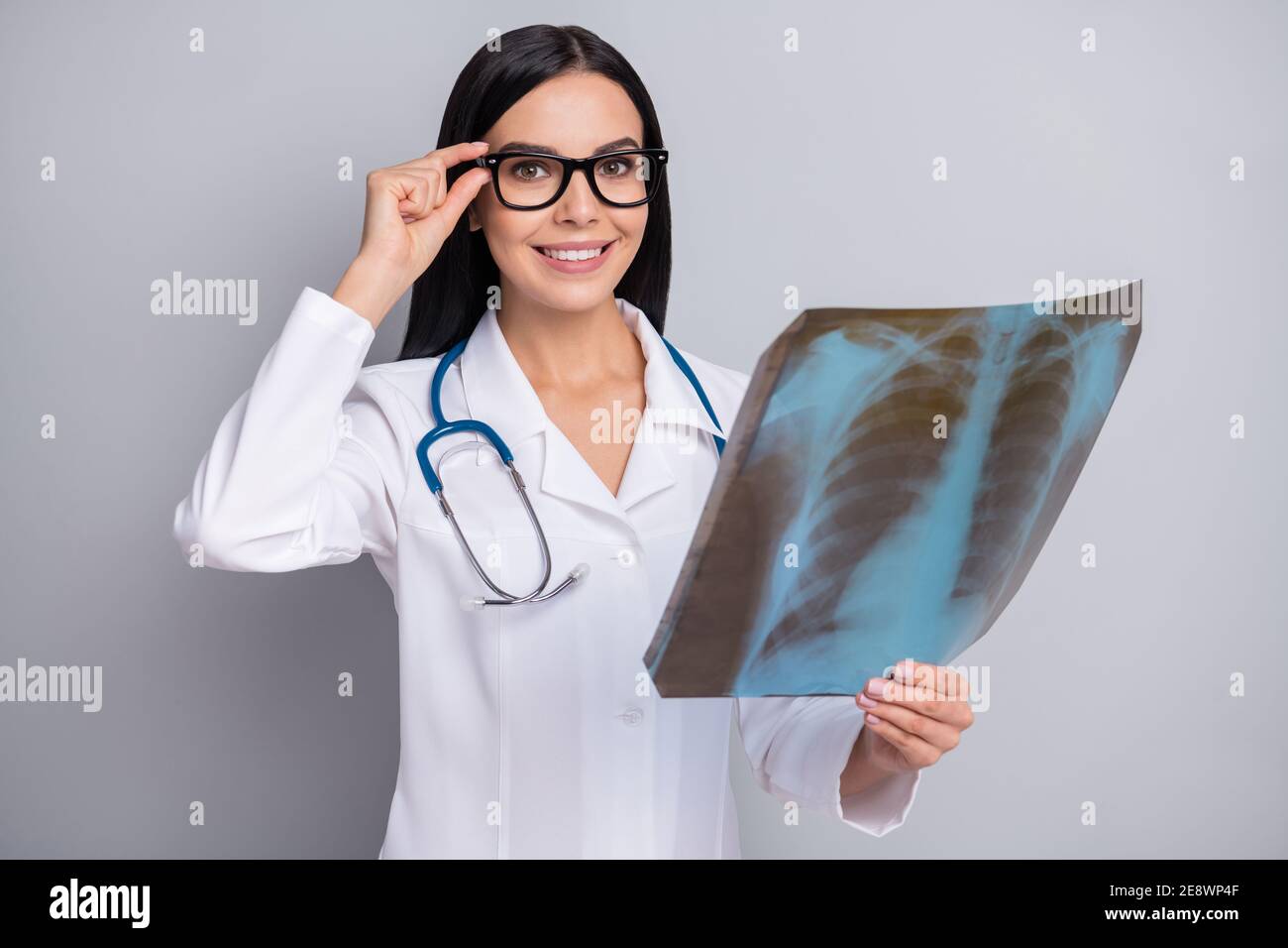 Photo of smart doctor lady examine x-ray wear eyeglasses stethoscope ...