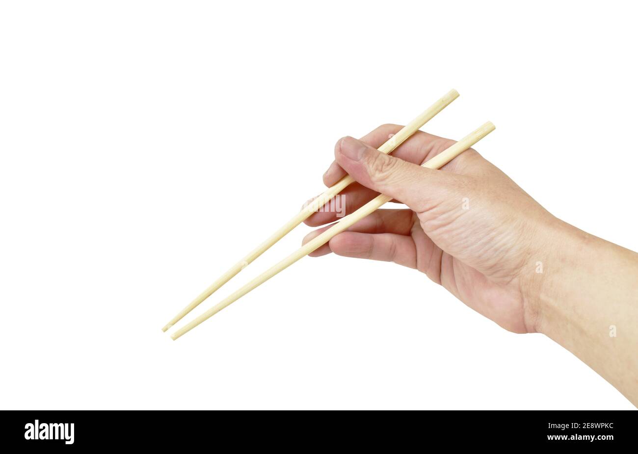 hand holding and use wooden chopsticks on white background Stock Photo ...