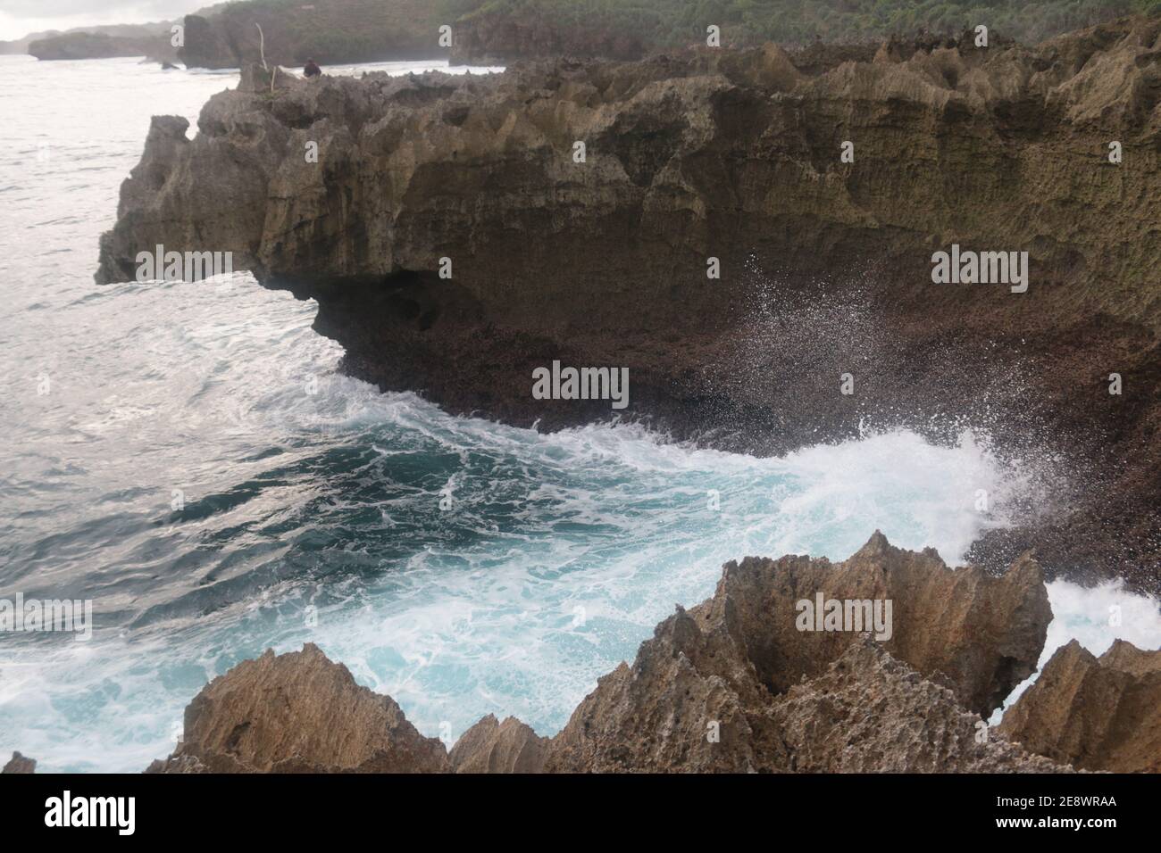 Crashing water hits rocks at Midodaren beach Stock Photo - Alamy