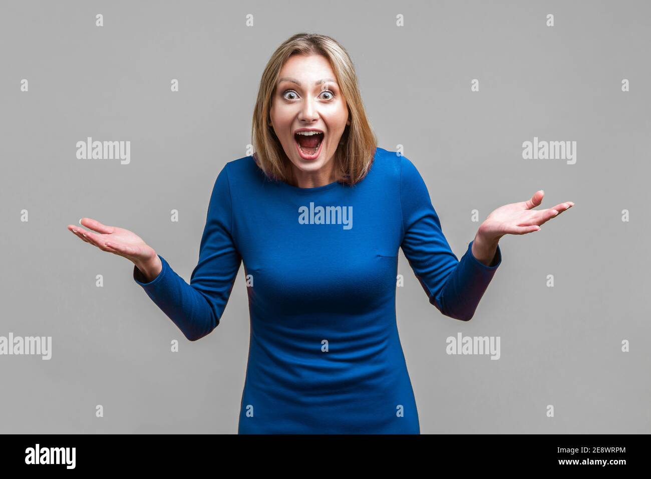 Wow, unbelievable! Portrait of positive astonished woman with widely ...