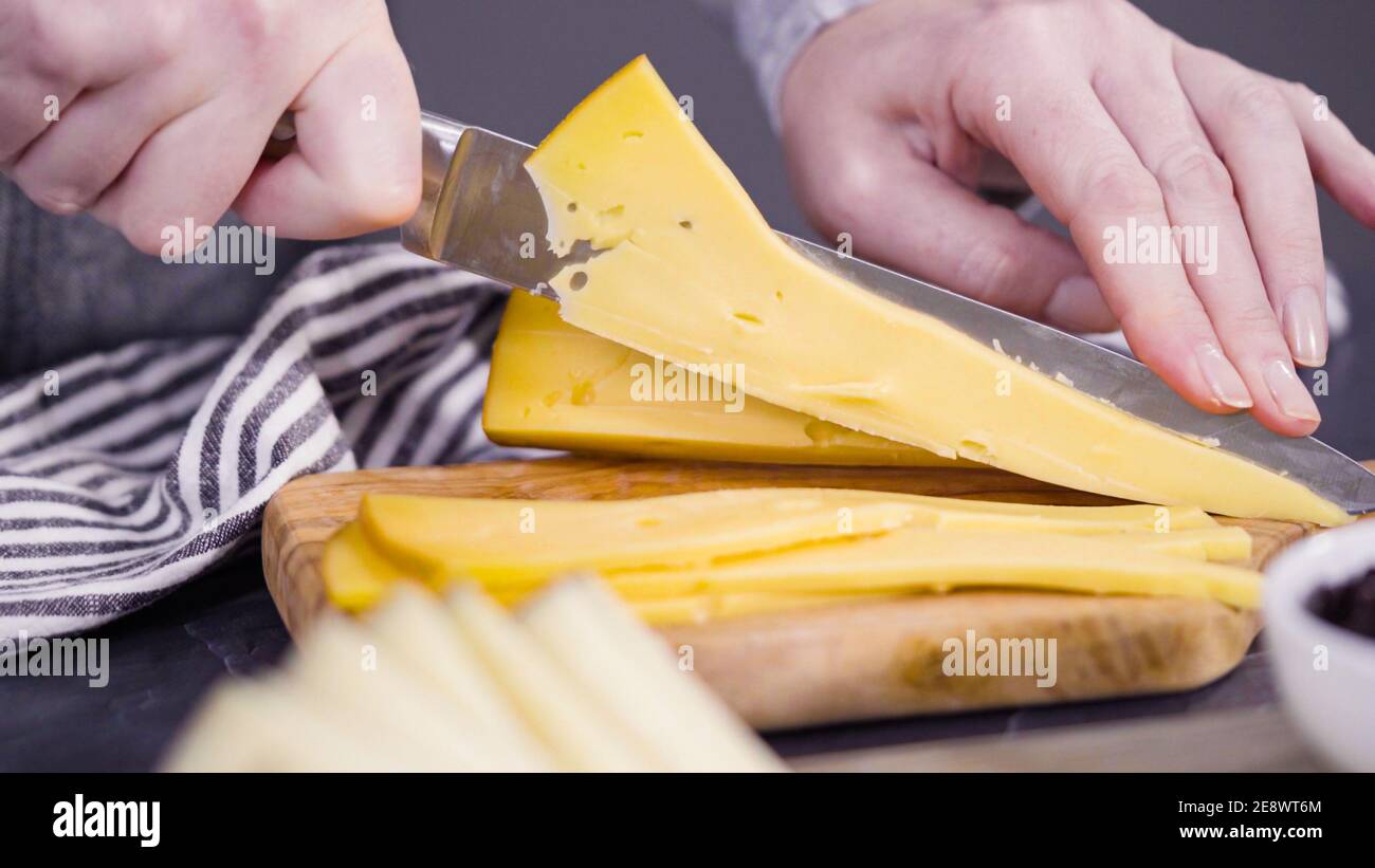Slicing gourmet wedge cheese small hi-res stock photography and images ...