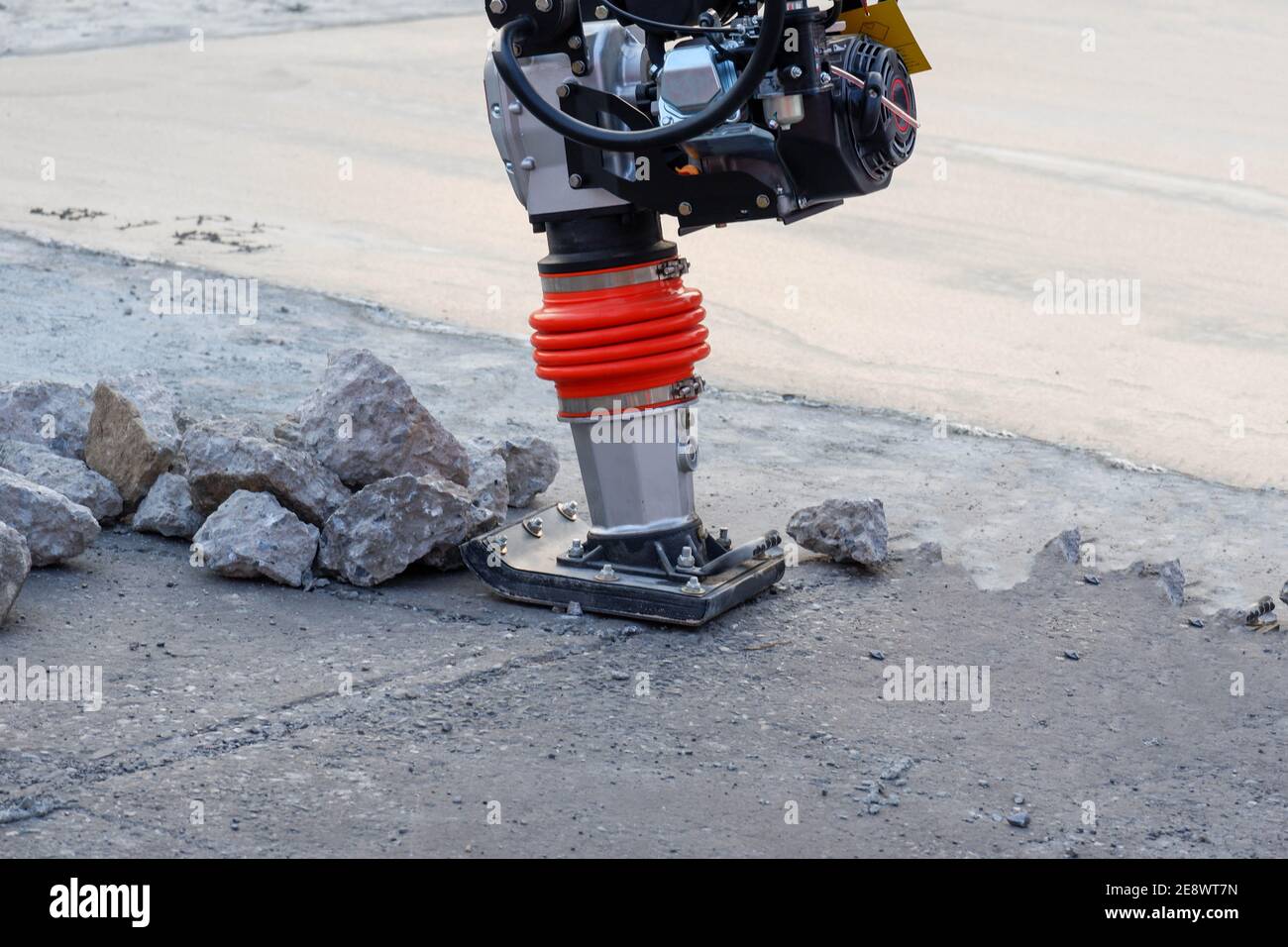 Vibrating soil compactor, base plate shaping machine Stock Photo - Alamy