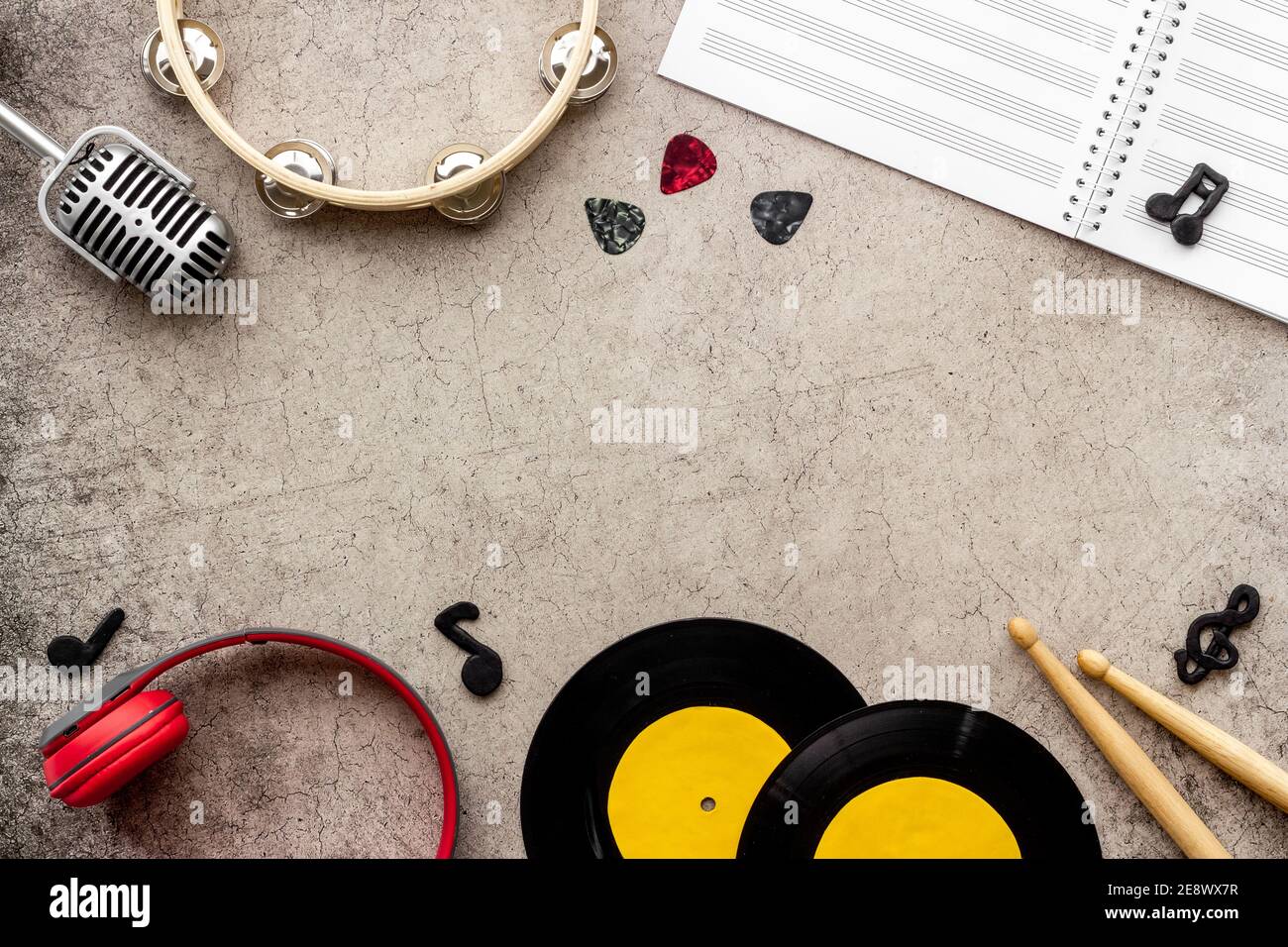 Flat lay of music background - instrument with sheet music, top view ...
