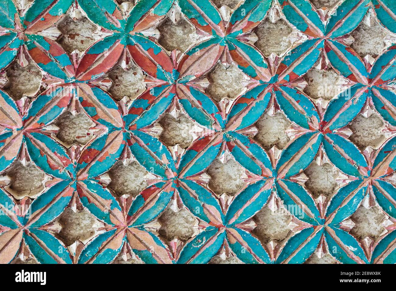 Ancient wooden flower pattern with blue accents Stock Photo - Alamy