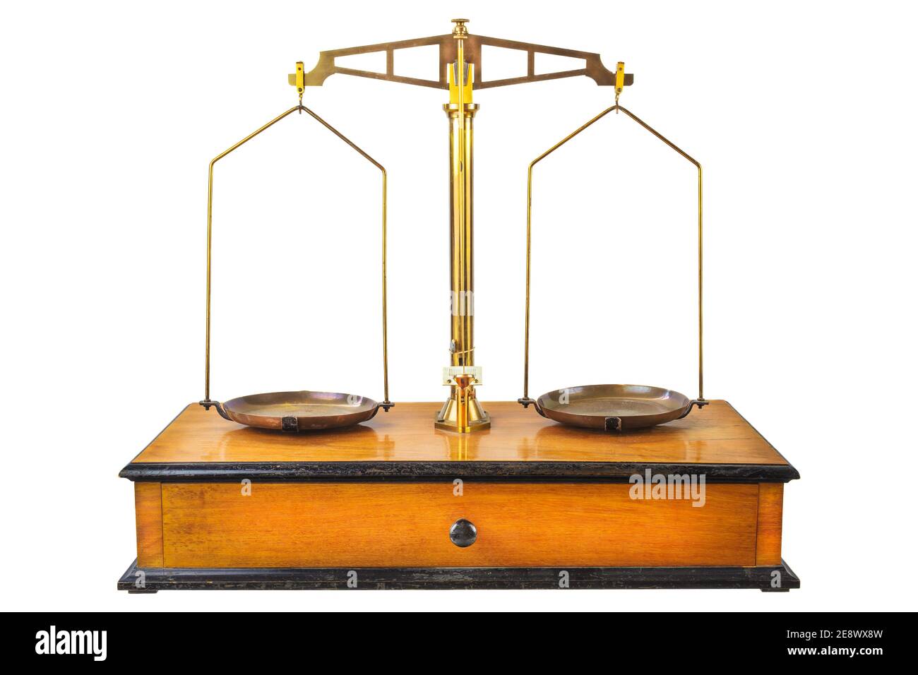 Ancient pharmacy balance with wooden base isolated on a white ...