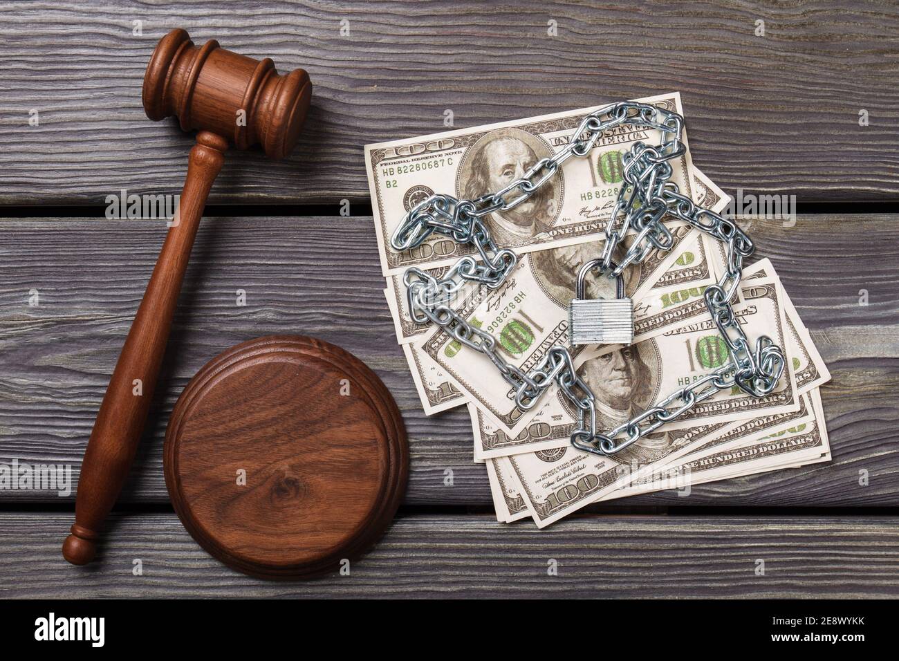 Flat lay money with chain and gavel Stock Photo - Alamy