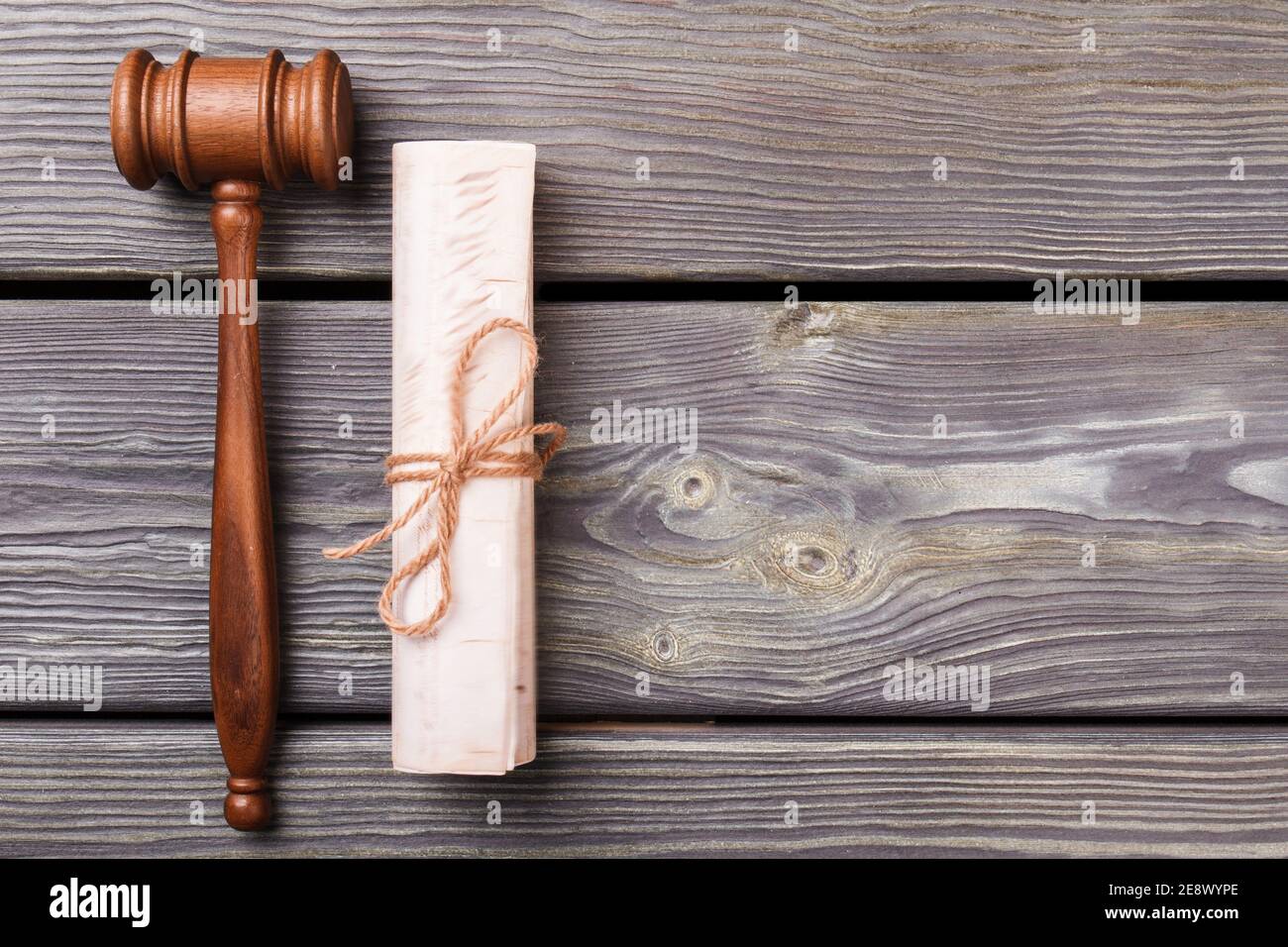 Judge hammer and scroll Stock Photo - Alamy
