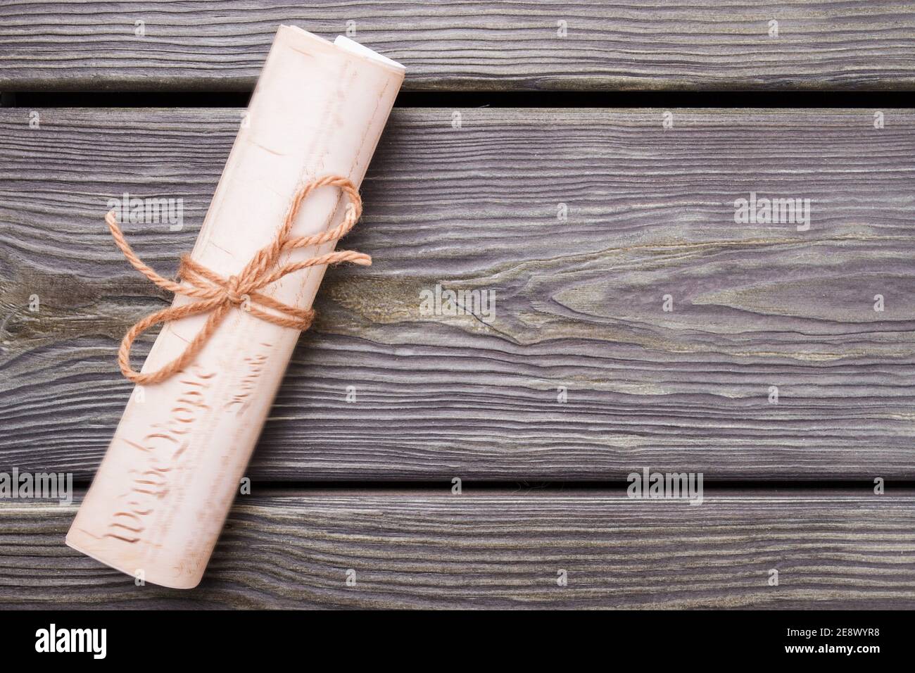 Scroll letter on wooden desk Stock Photo - Alamy