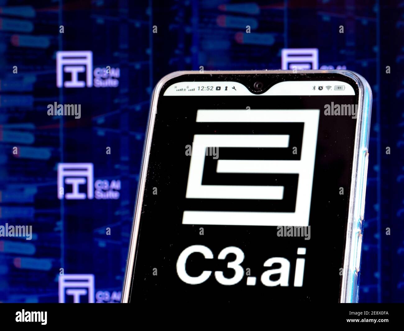In this photo illustration a C3.ai, Inc. logo is seen displayed on a ...