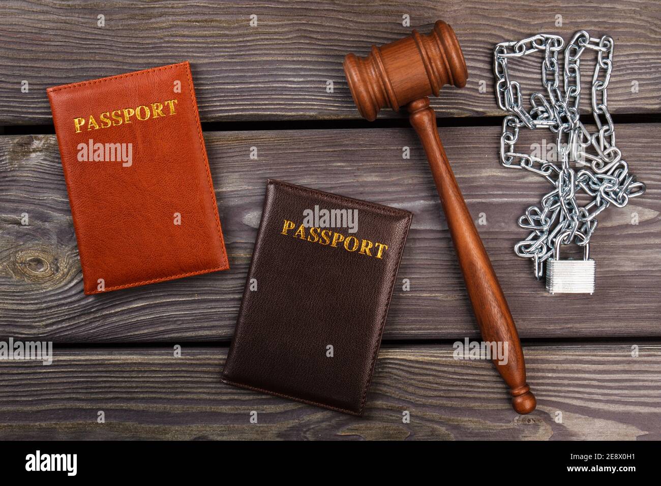 Top view passports gavel and chains Stock Photo - Alamy