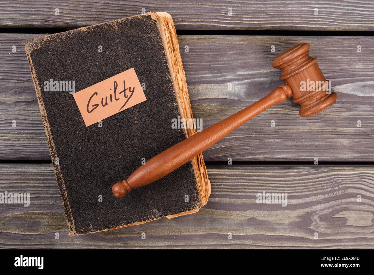 Old book gavel and guilty verdict Stock Photo - Alamy