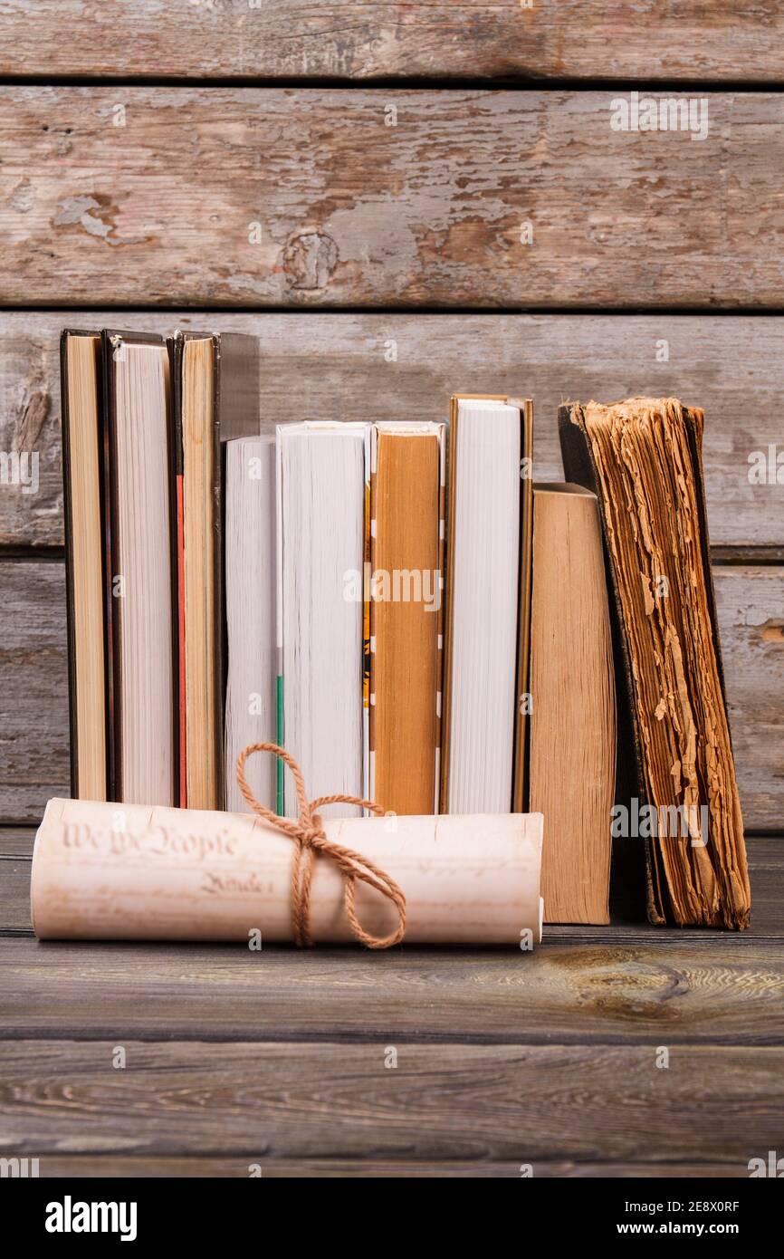 Still life books and scroll Stock Photo - Alamy