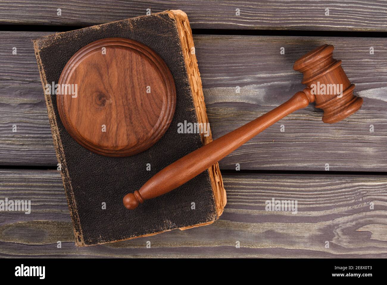 Gavel with sounding block and old law book Stock Photo - Alamy