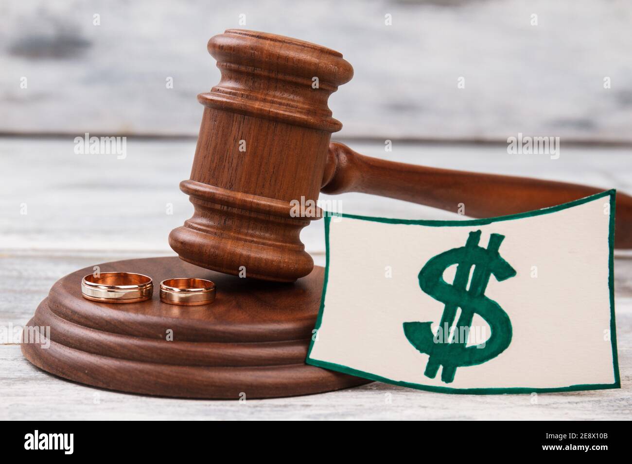 Wooden gavel and dollar sign Stock Photo - Alamy