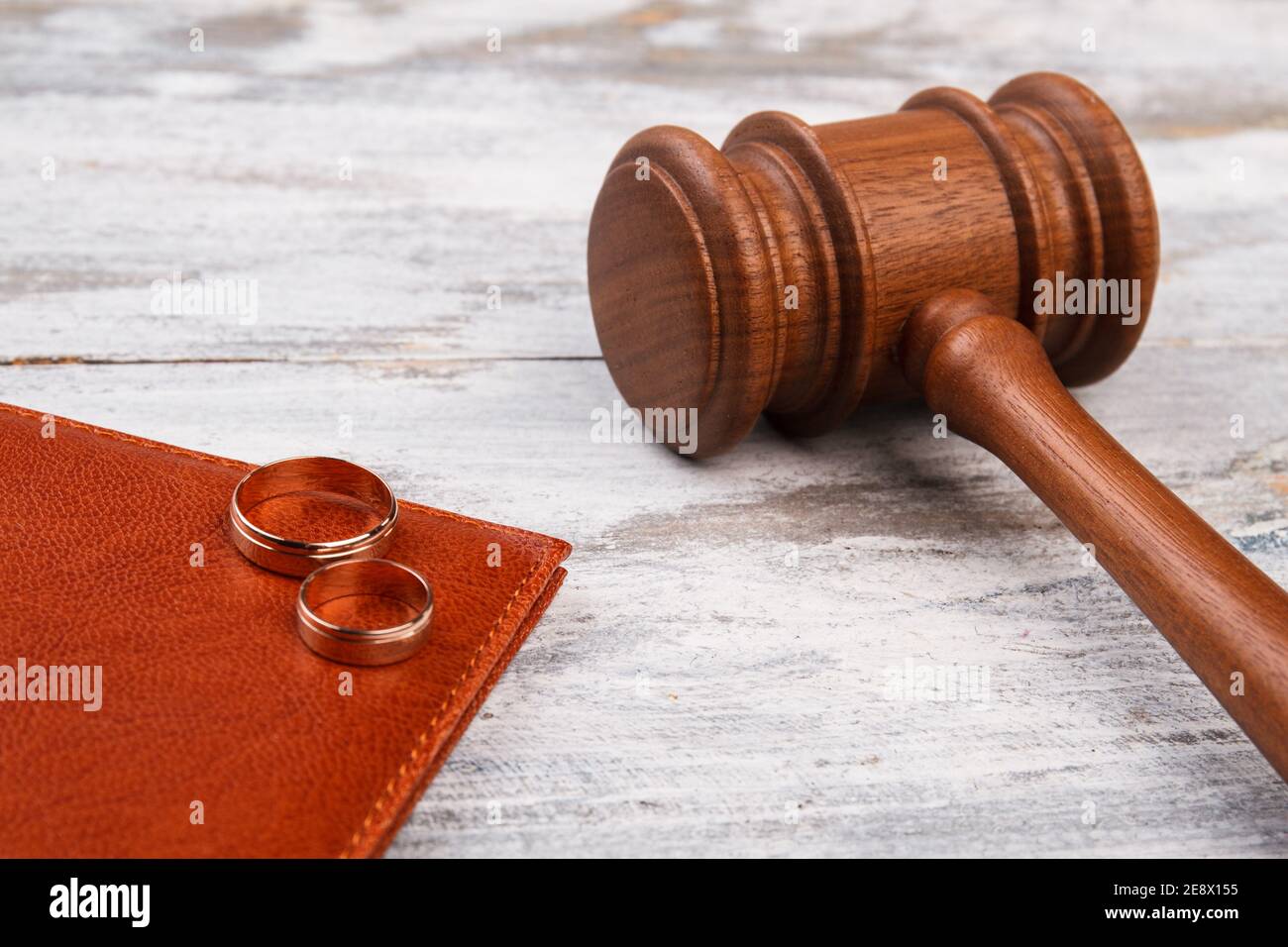 Close-up gavel and wedding rings Stock Photo - Alamy