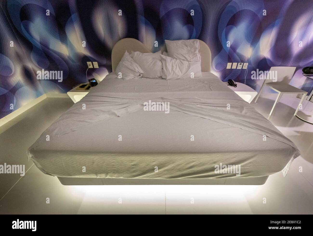 Undone hotel bed Stock Photo - Alamy