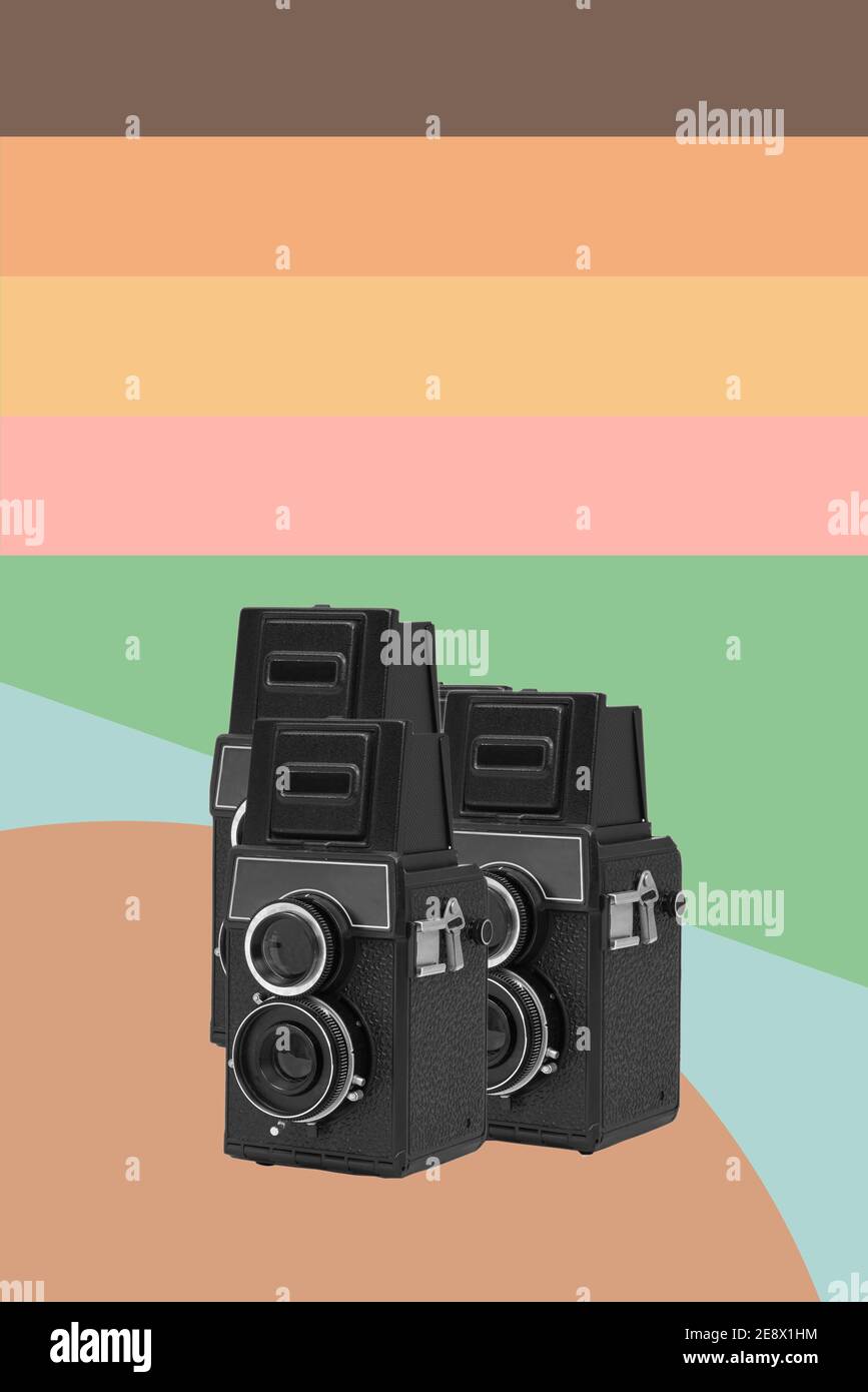 some black retro medium format film cameras background patterned with ...