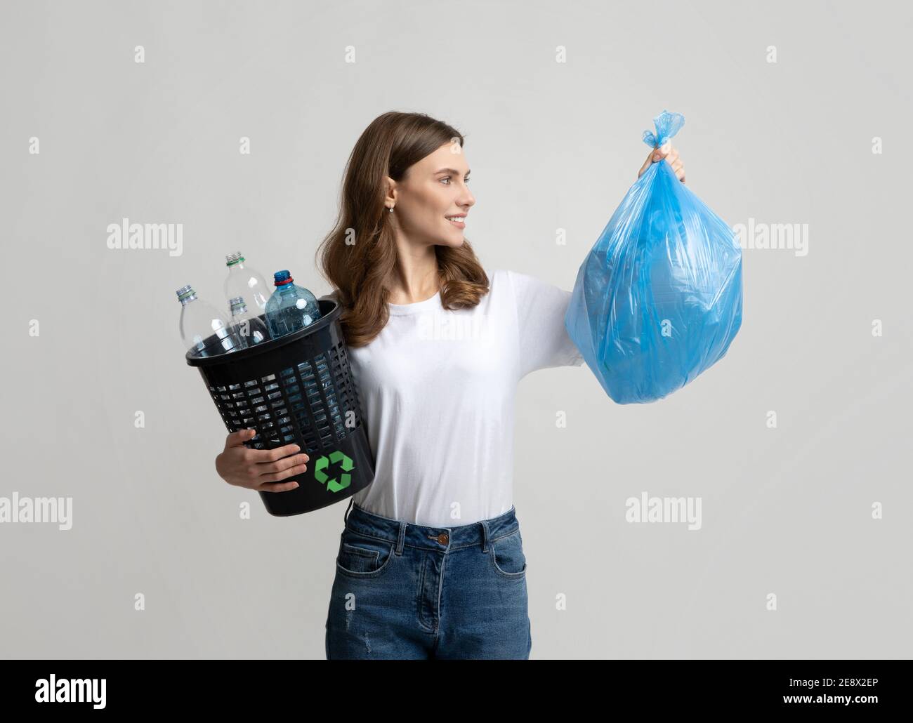 Waste Sorting. Positive Lady Holding Bag With Garbage And Plastic ...
