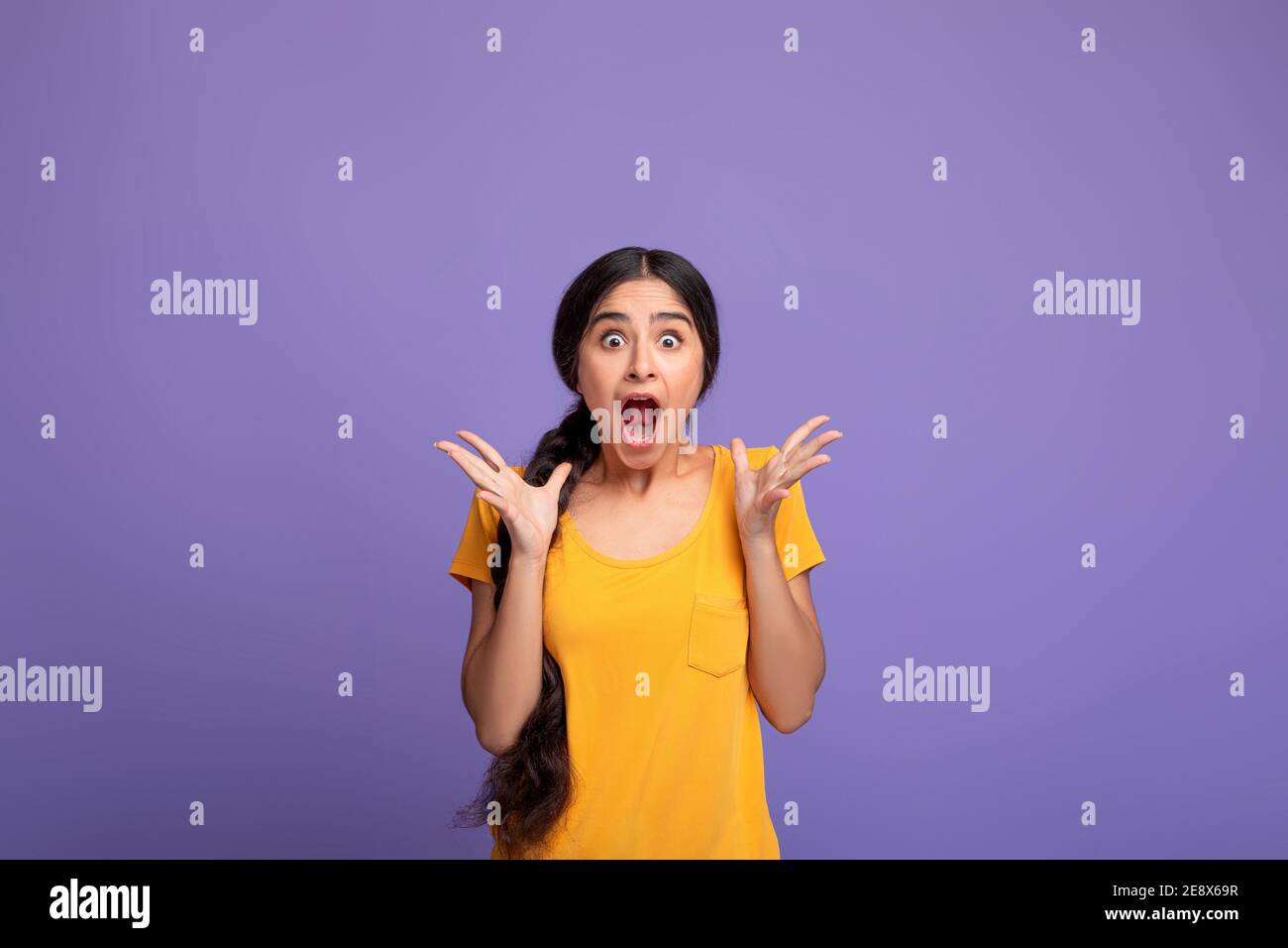 Close up portrait of shocked young indian woman screaming Stock Photo ...