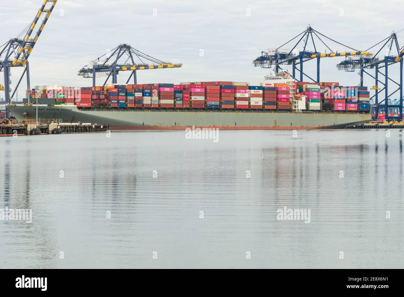 Container ship Henry Hudson Bridge shown loading/unloading at the Port ...