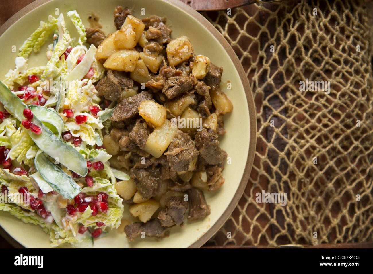 Venison chunks from a fallow deer that have been fried with diced lamb ...