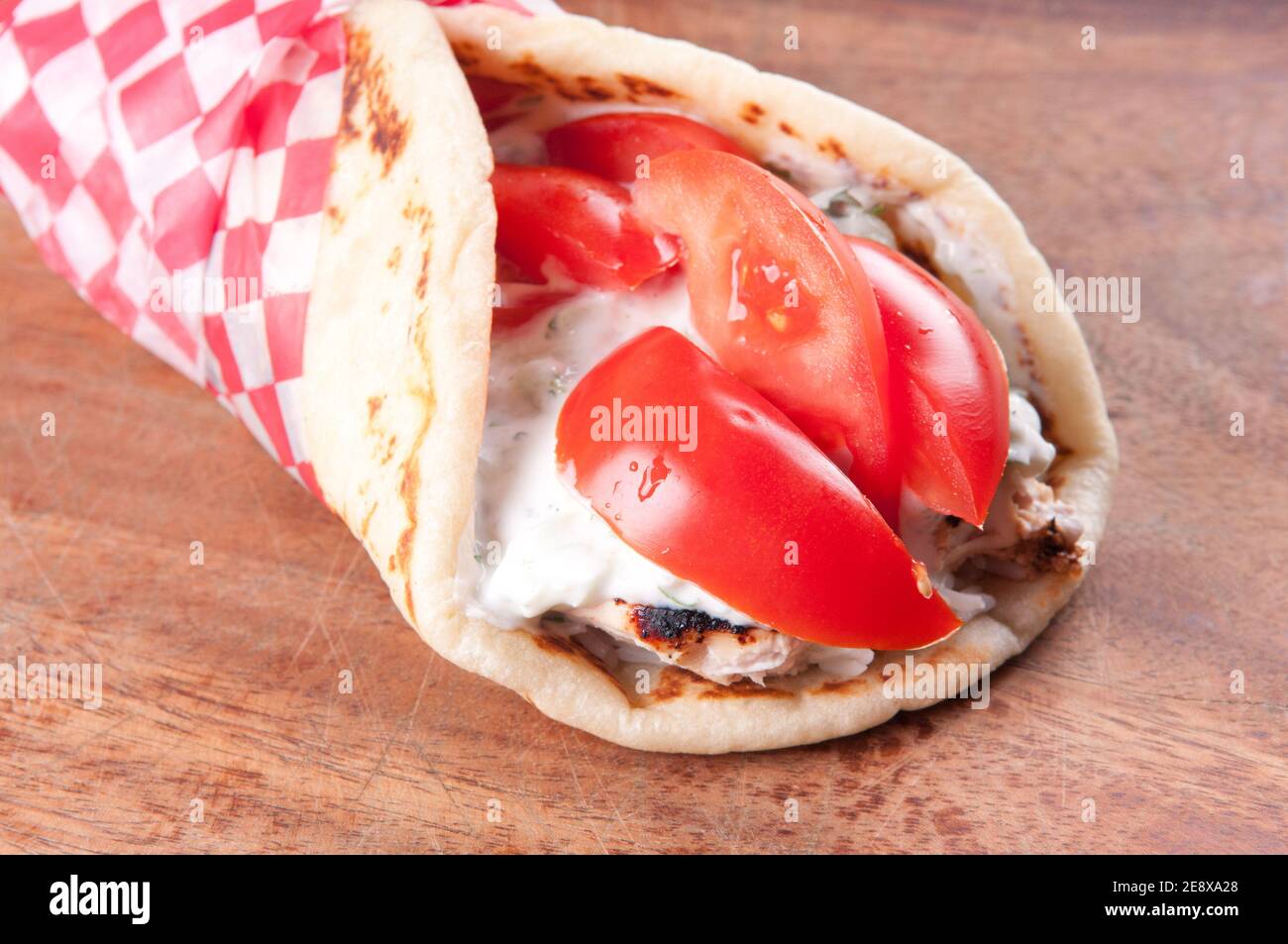 chicken pita wrap with tomato Stock Photo - Alamy
