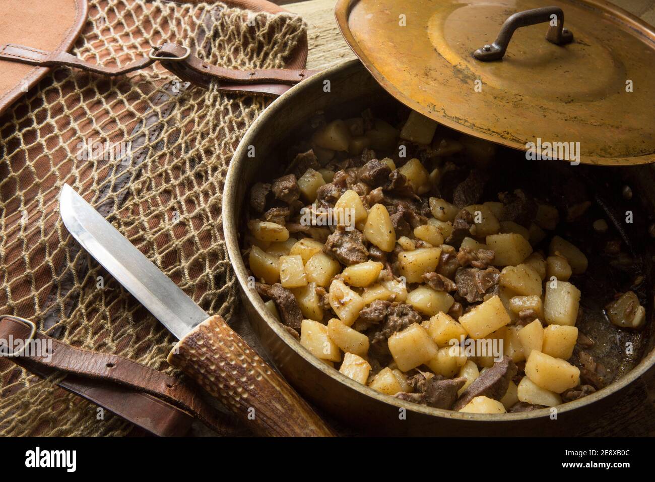 Venison chunks from a fallow deer that have been fried with diced lamb ...