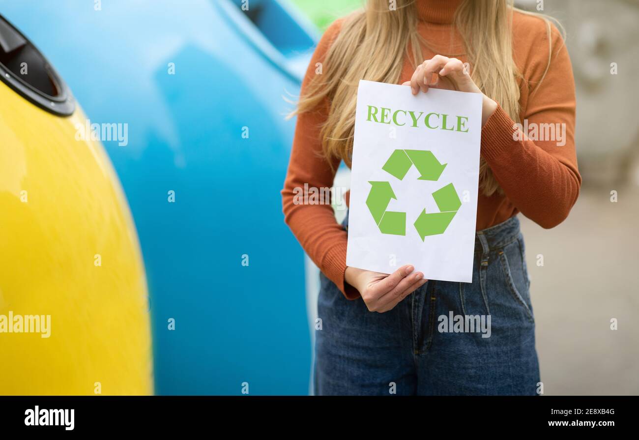 Woman Holding Placard With Green Recycle Sign Standing Near Colorful ...