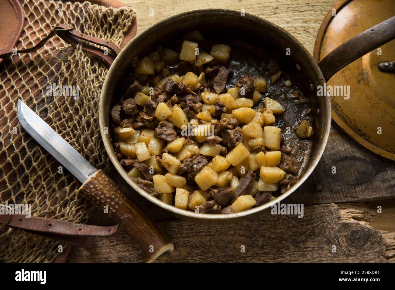 Venison chunks from a fallow deer that have been fried with diced lamb ...