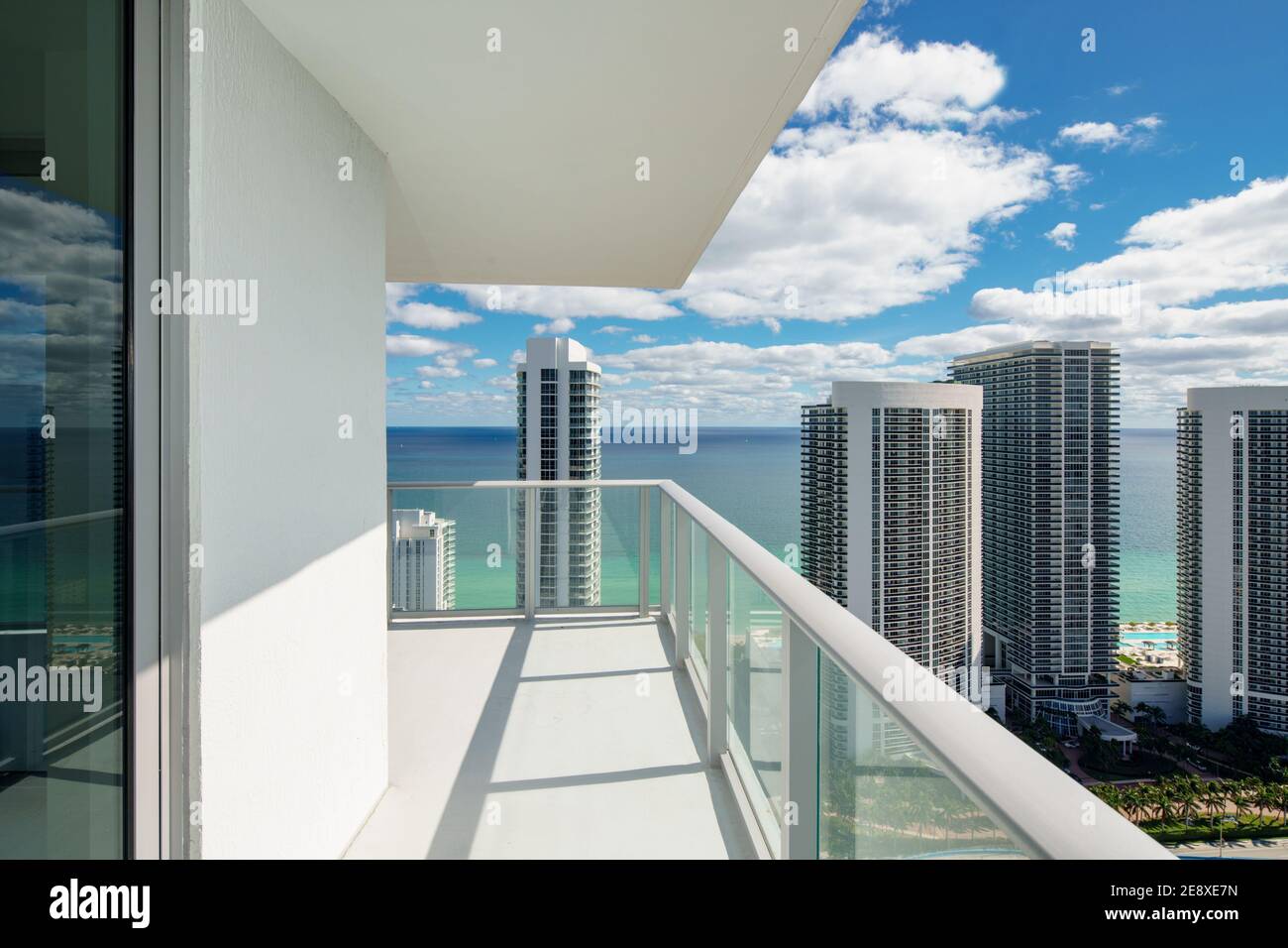 Luxury condo balcony with coastal ocean water view Stock Photo - Alamy
