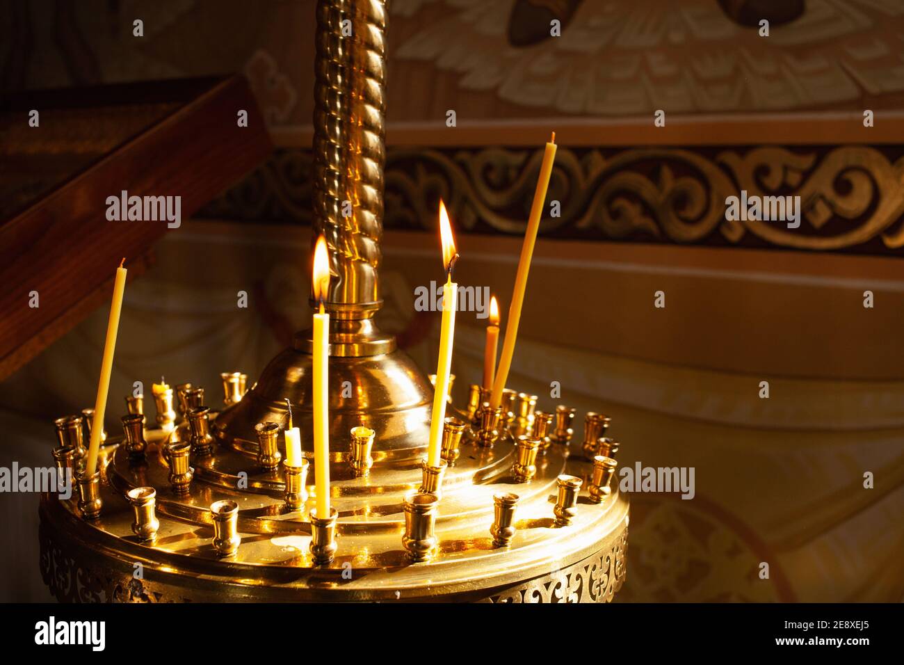 Candlestick. Candles in the church, church candle stand. Candles are ...