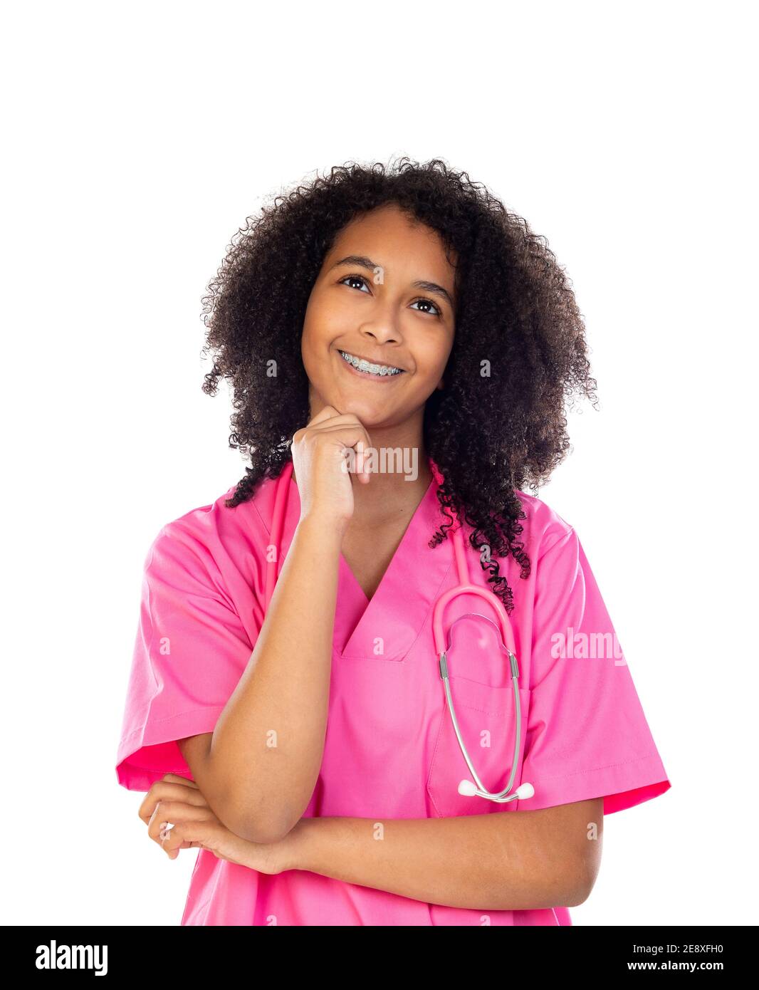 Adorable little doctor with pink uniform isolated on a white background ...