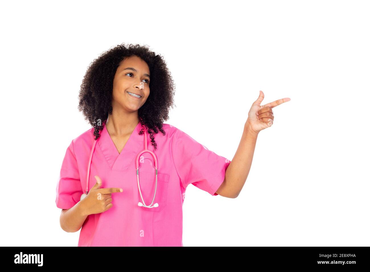 Adorable little doctor with pink uniform isolated on a white background ...