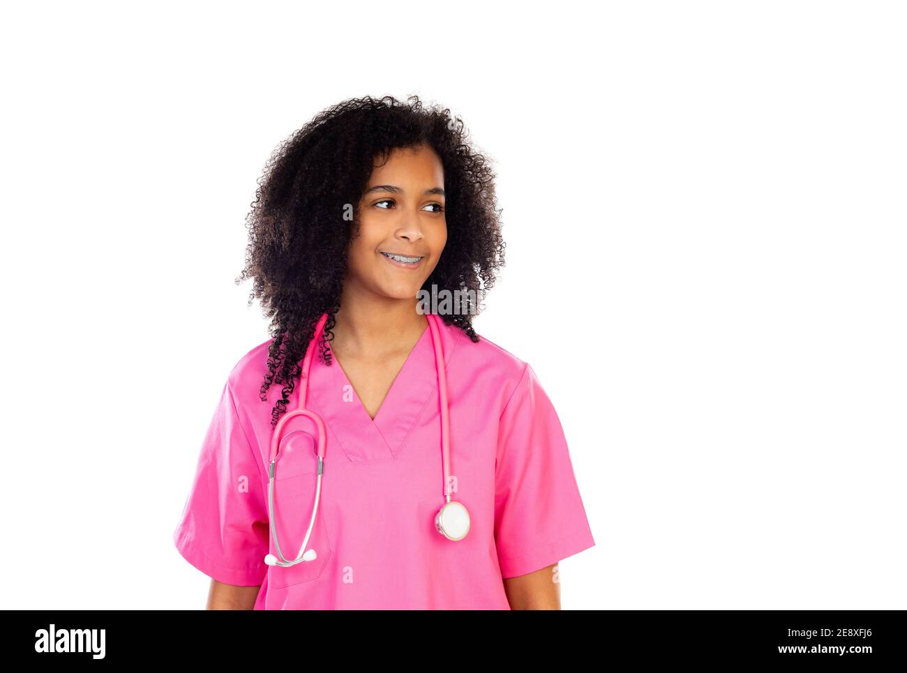 Adorable little doctor with pink uniform isolated on a white background ...