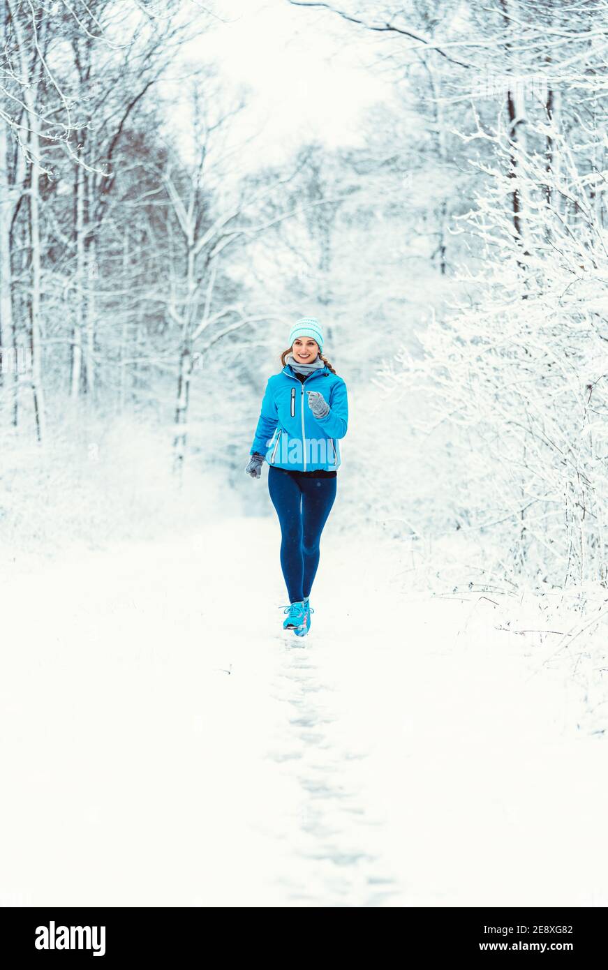 Woman running towards camera hi-res stock photography and images - Alamy