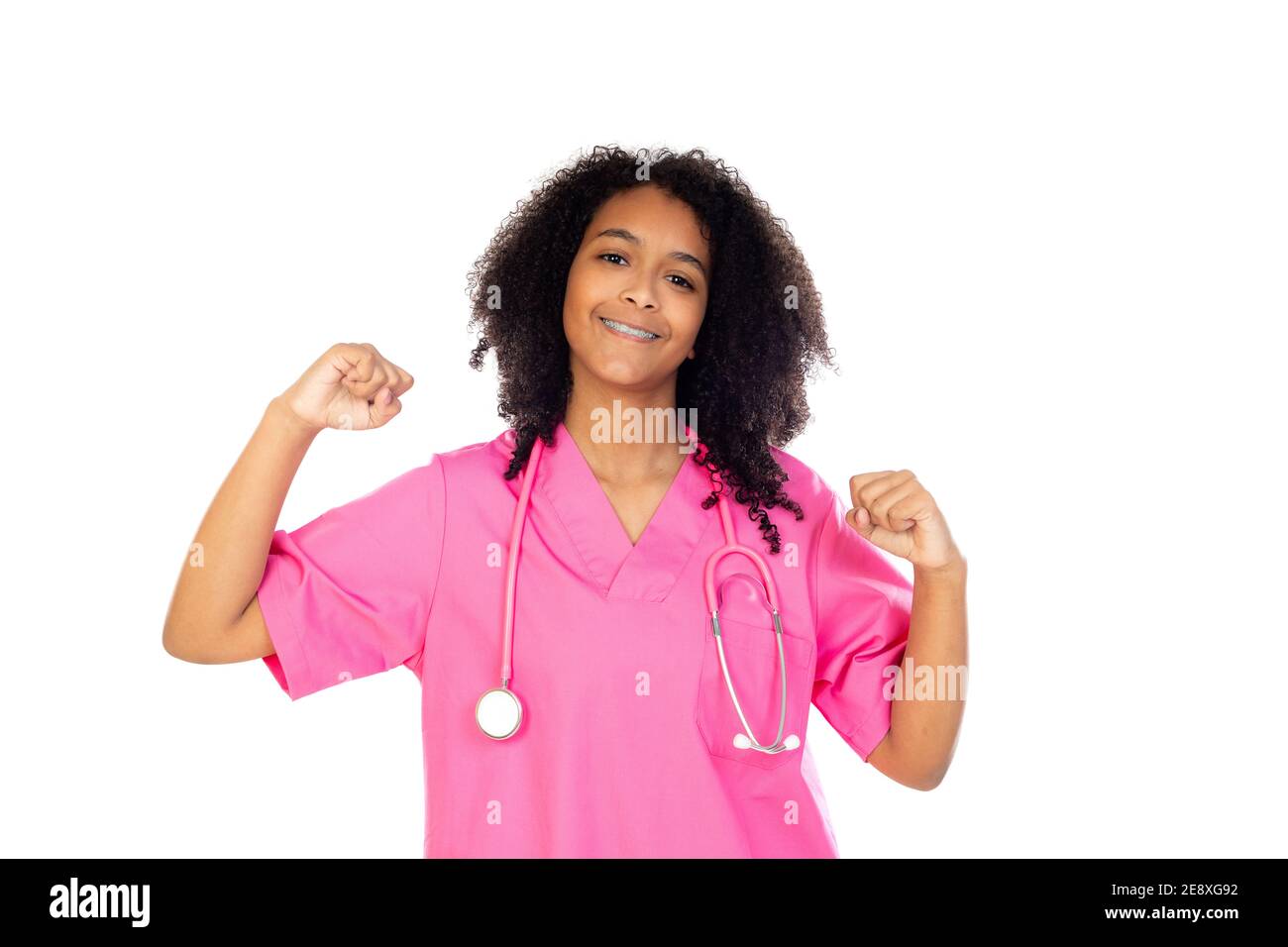 Adorable little doctor with pink uniform isolated on a white background ...