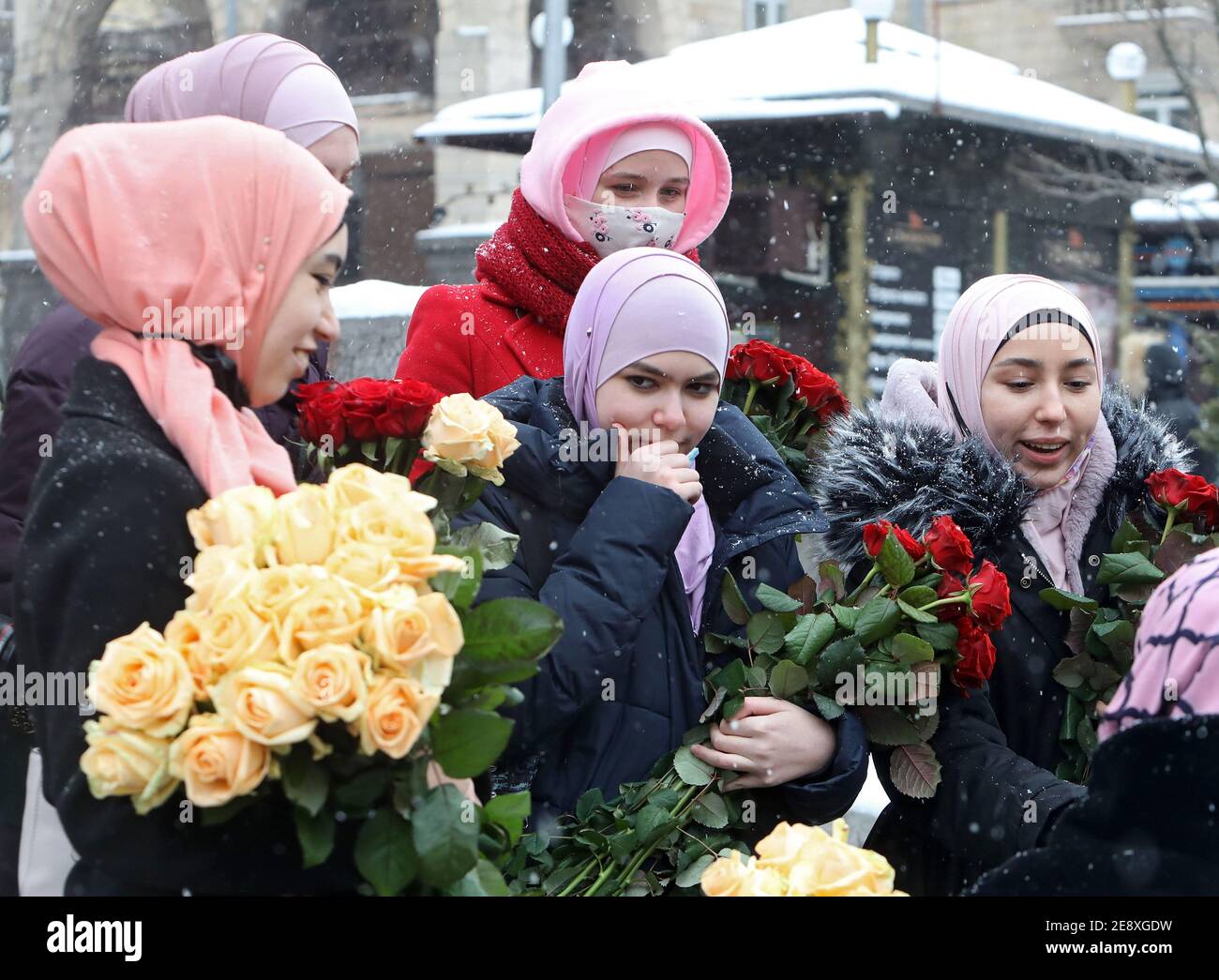 Non Exclusive: KYIV, UKRAINE - FEBRUARY 1, 2021 - Women in hijabs hold ...