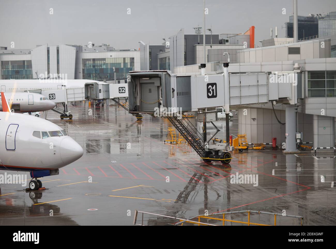 Passenger boarding bridge closed ramp in airport Stock Photo - Alamy