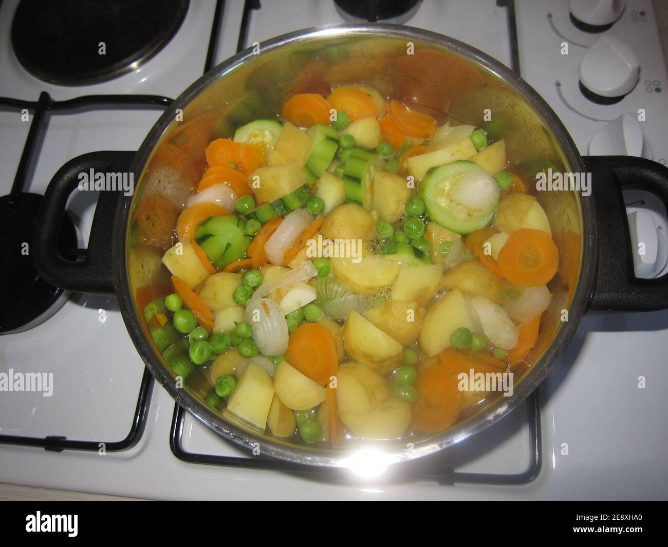 Vegetable pot cooking in a pan Stock Photo - Alamy