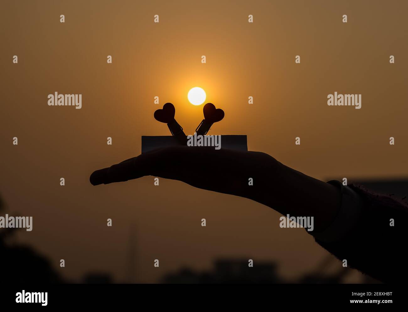 Hands capturing sun hi-res stock photography and images - Alamy