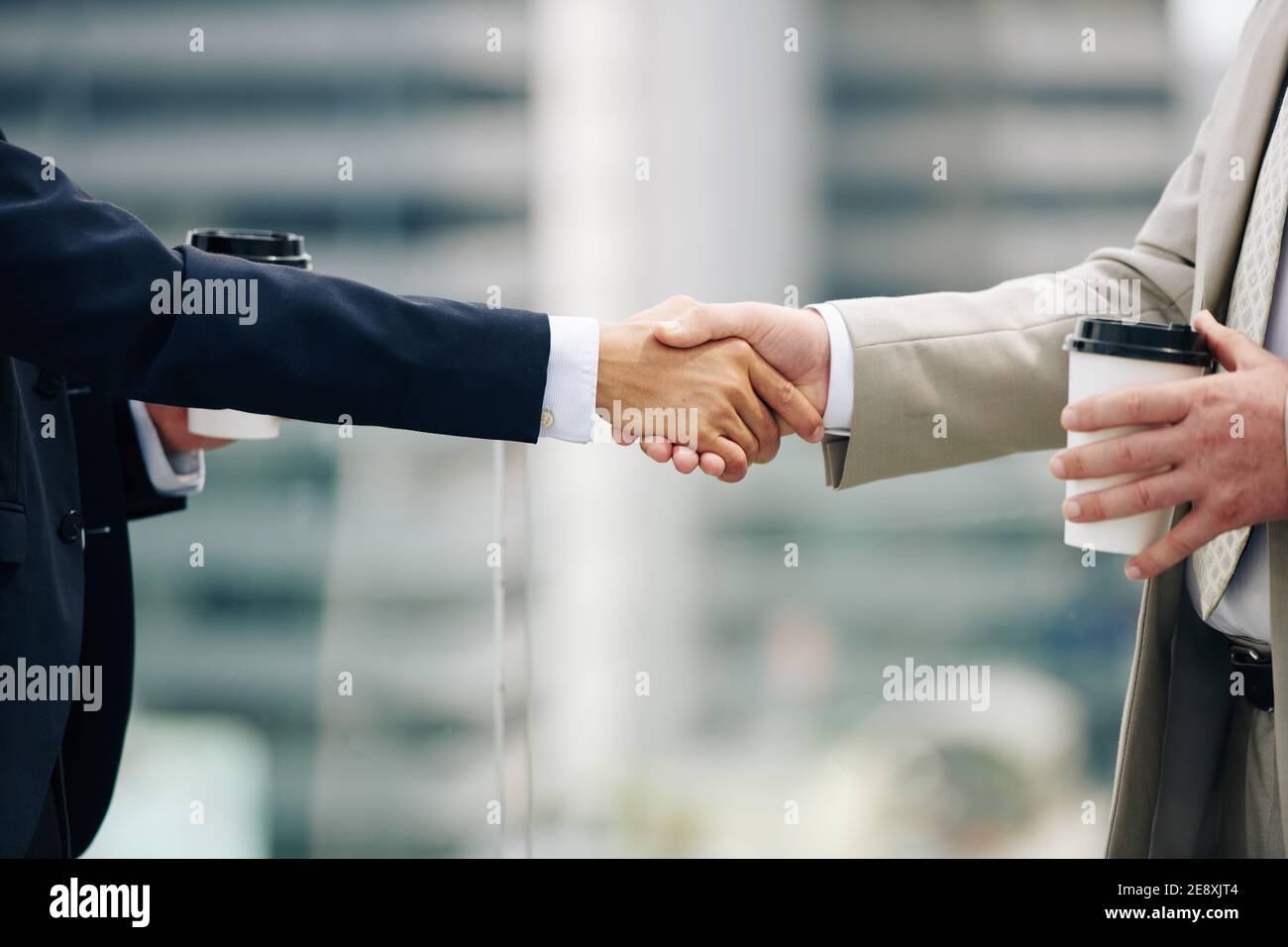 Business people shaking hands Stock Photo - Alamy