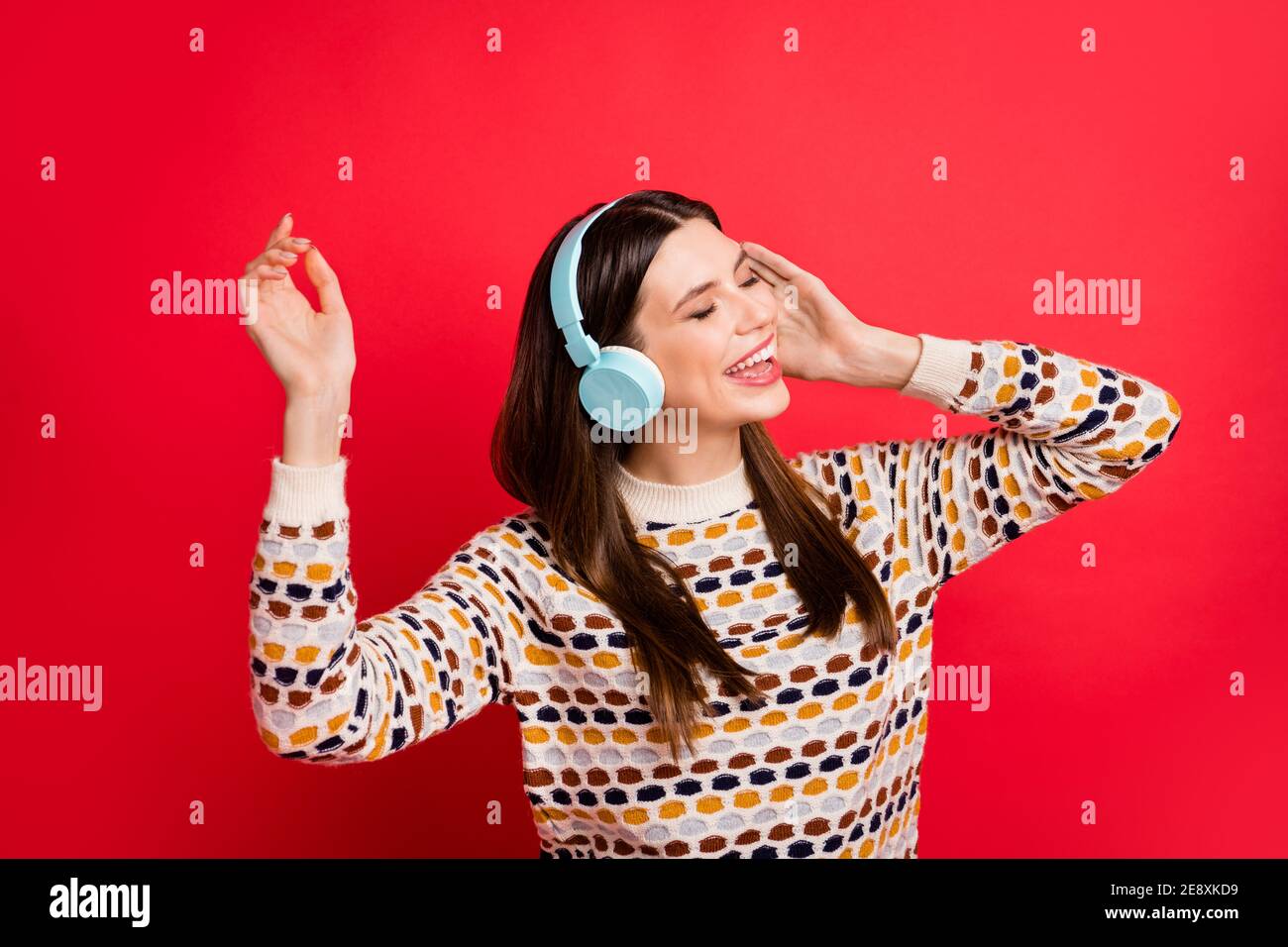 Photo portrait of positive female singer in earphones performing hit ...