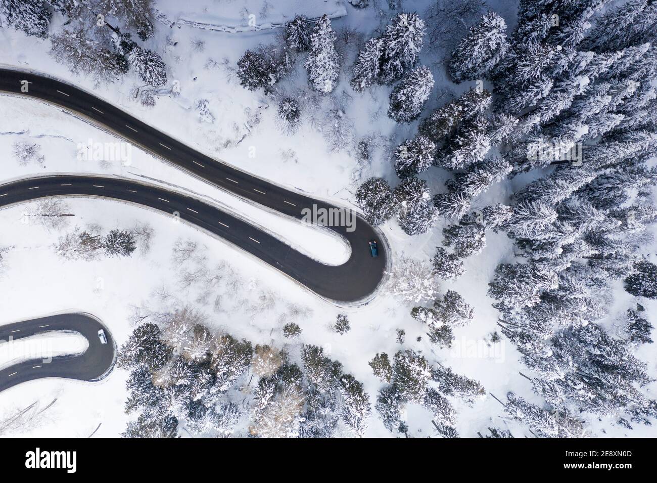 Car driving down winding road hi-res stock photography and images - Alamy