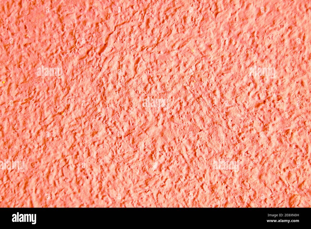 Abstract grainy texture on light orange wall. Design element and ...