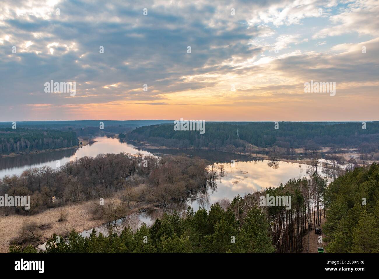 A picture of the sun setting over the Neman river, as seen from the top ...
