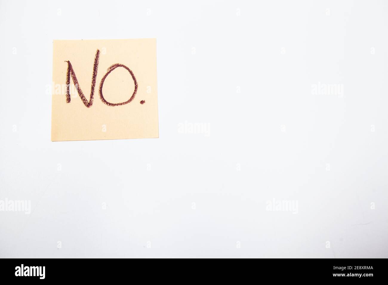 Text written NO on yellow note pad isolated Stock Photo - Alamy