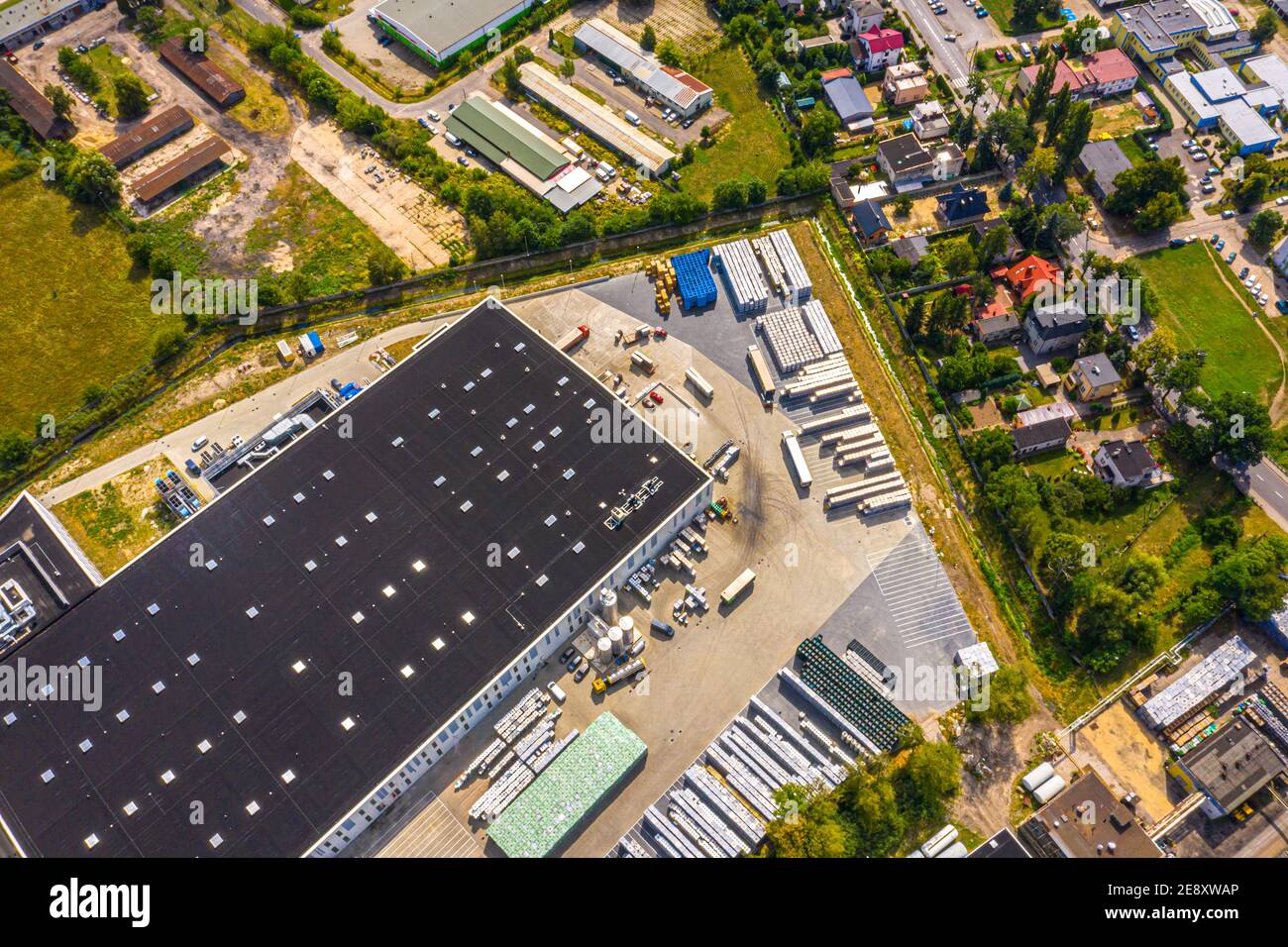 Aerial view of goods warehouse. Logistics delivery center in industrial ...