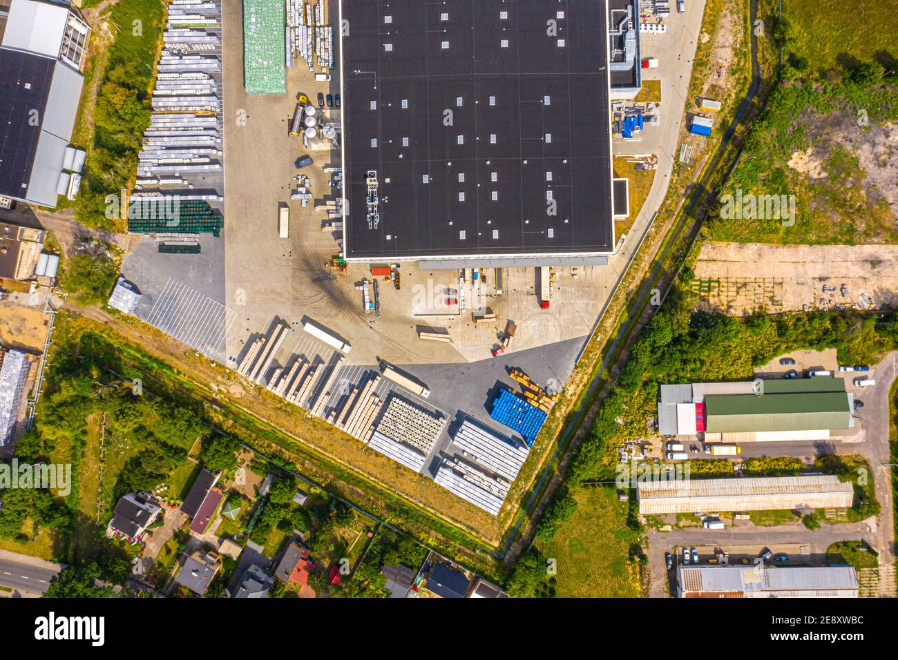 Aerial view of goods warehouse. Logistics delivery center in industrial ...